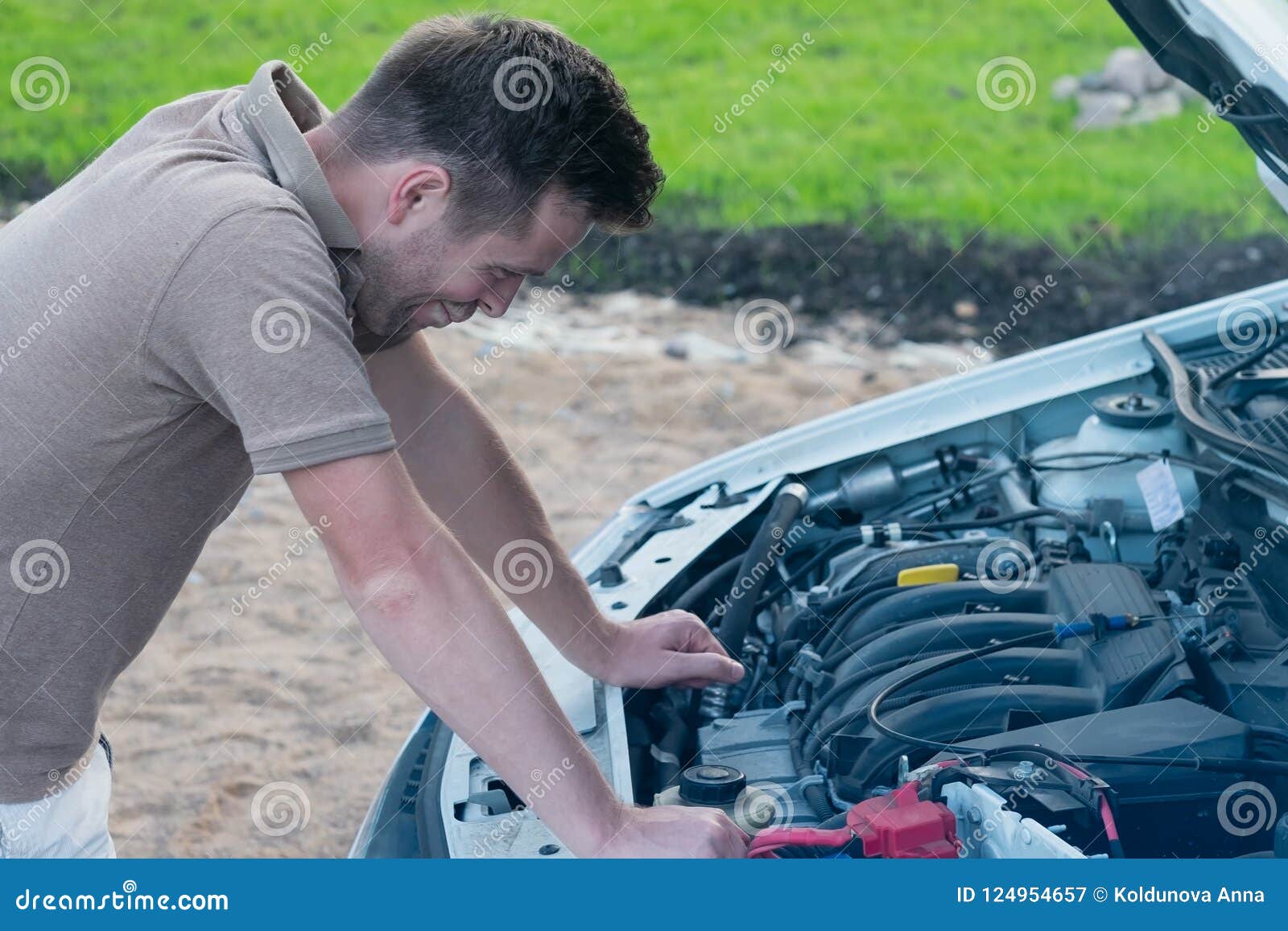 Young Stressed Man Having Trouble with His Broken Car Looking in ...