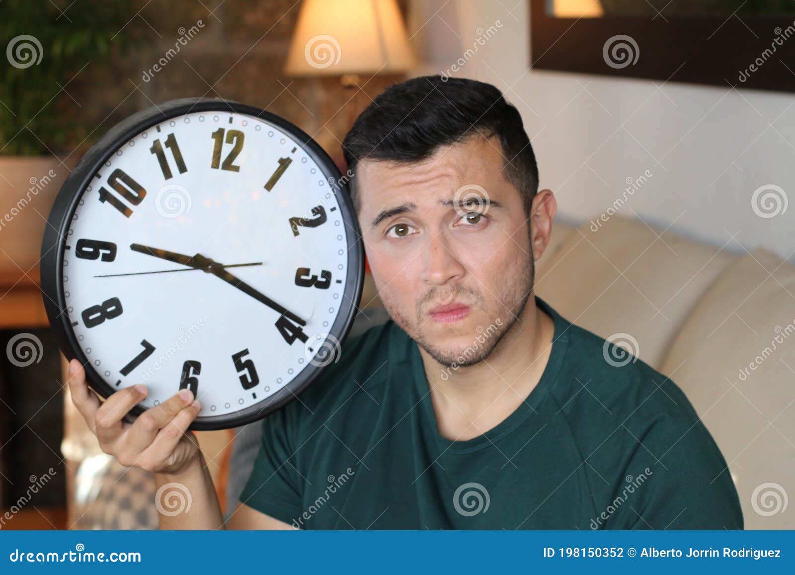Young Stressed Man Holding Clock Stock Photo - Image of fear, late ...