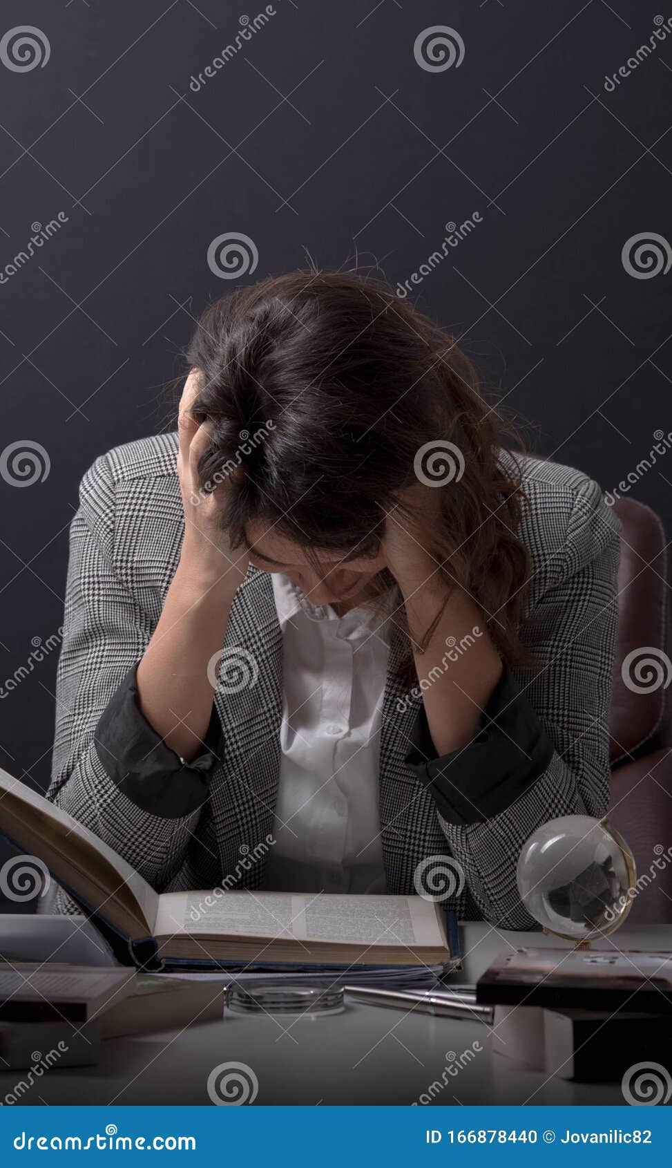 Young Stressed Student Girl Studying Pile of Books on Library Desk ... Young Stressed Student Girl Studying Pile of Books on Library Desk ...