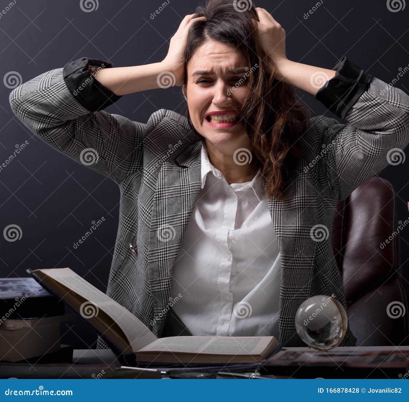 Young Stressed Student Girl Studying Pile of Books on Library Desk ... Young Stressed Student Girl Studying Pile of Books on Library Desk ...