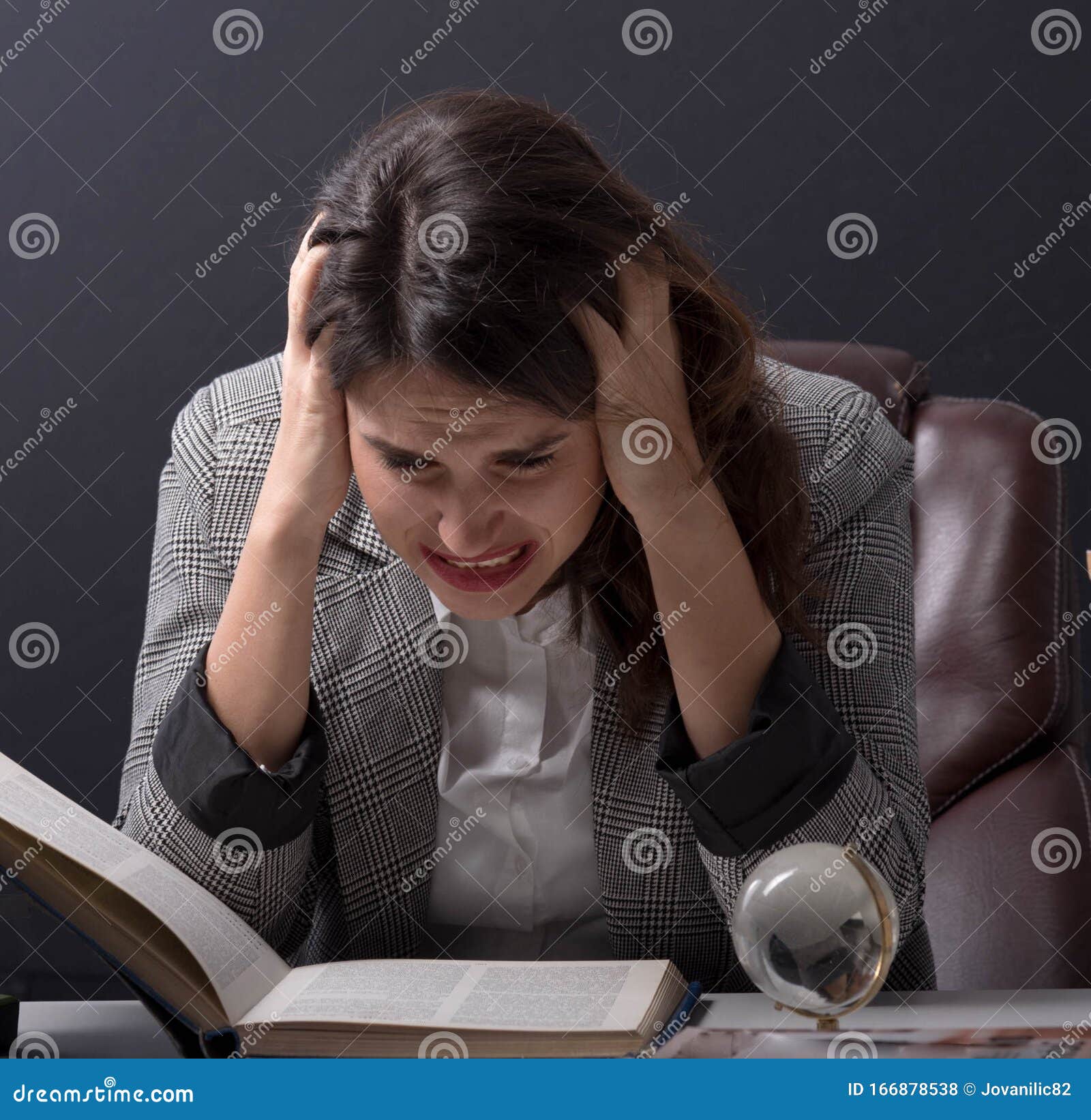 Young Stressed Student Girl Studying Pile of Books on Library Desk ... Young Stressed Student Girl Studying Pile of Books on Library Desk ...