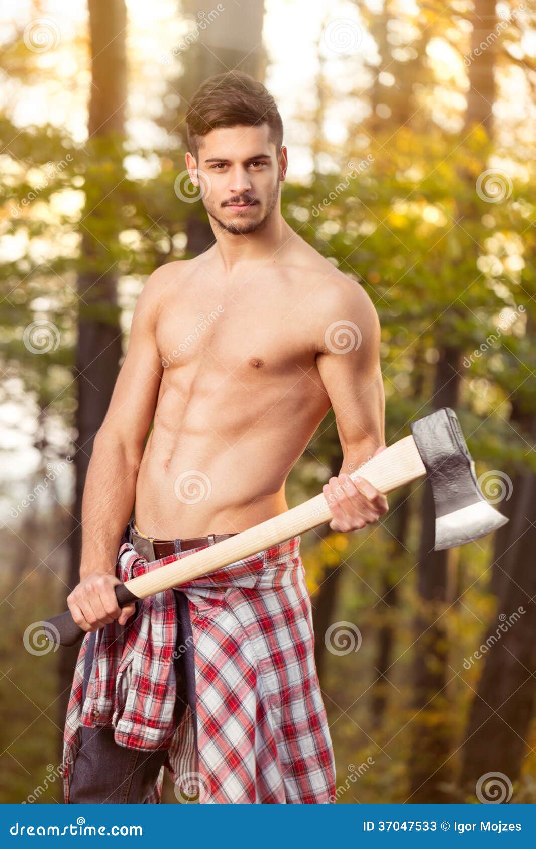 Young strong man in forest stock image. Image of muscular - 37047533
