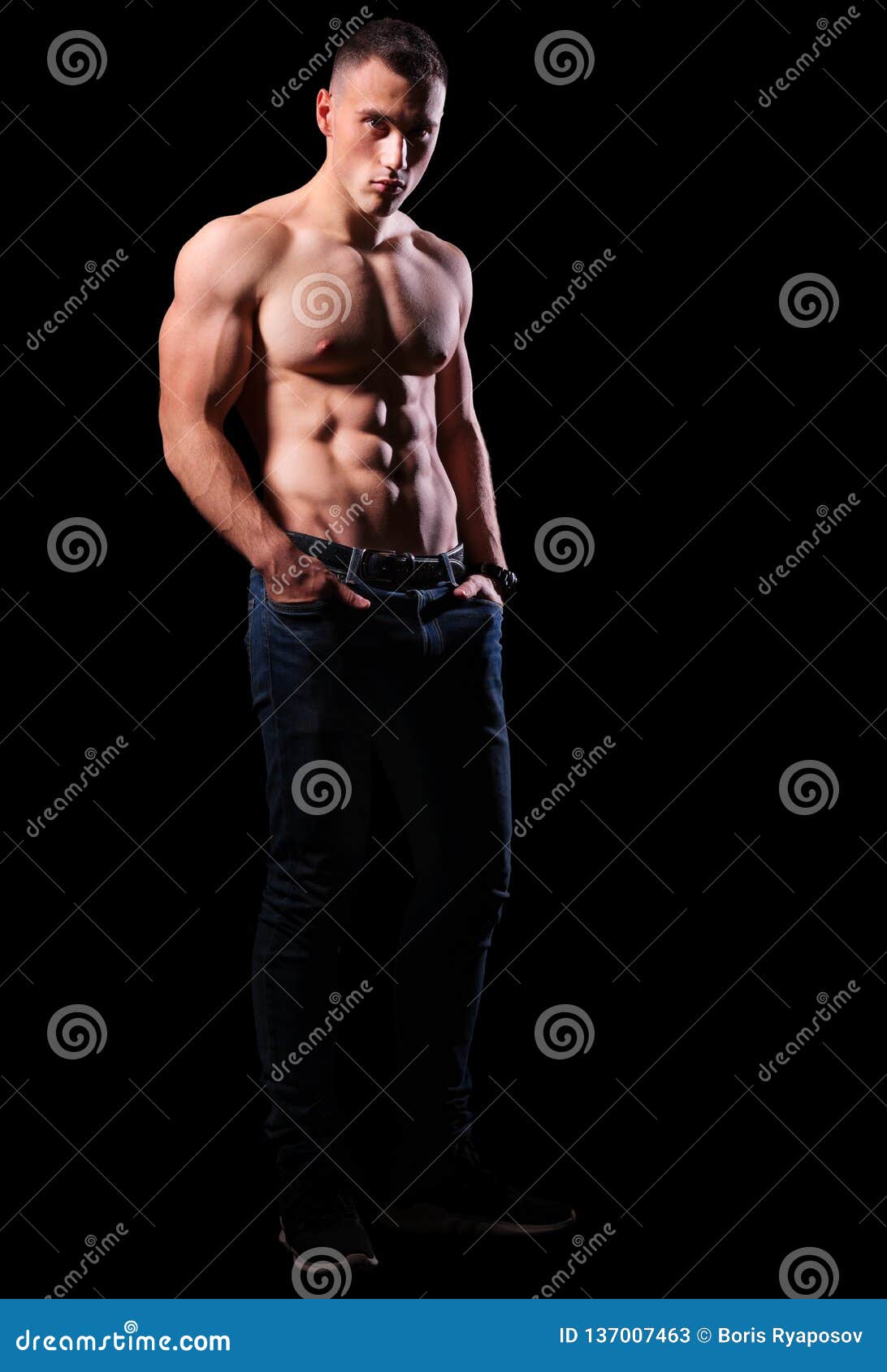 Young strong man isolated stock image. Image of abdomen - 137007463