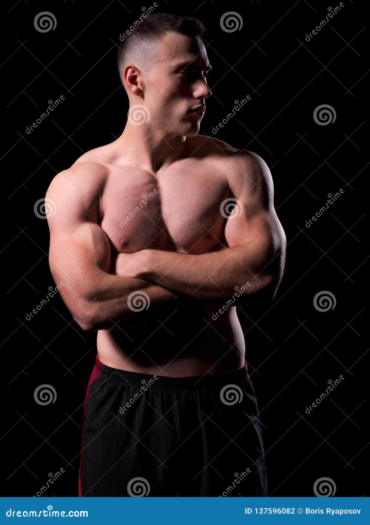 Young strong man isolated stock photo. Image of masculine - 137596082