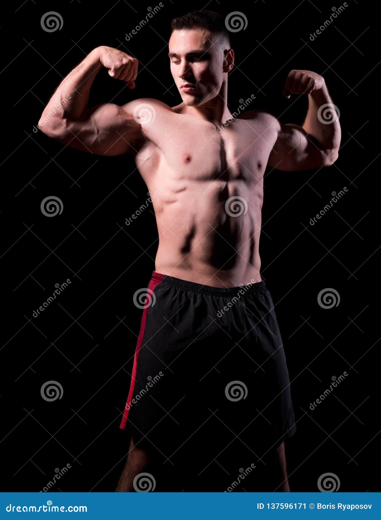 Young strong man isolated stock image. Image of male - 137596171
