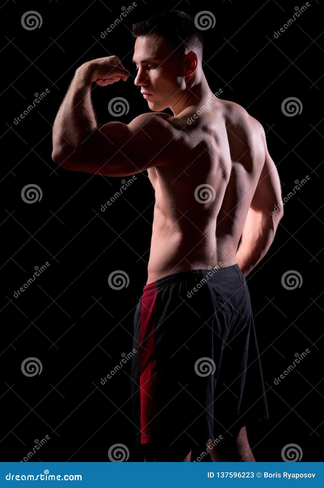 Young strong man isolated stock image. Image of athletic - 137596223