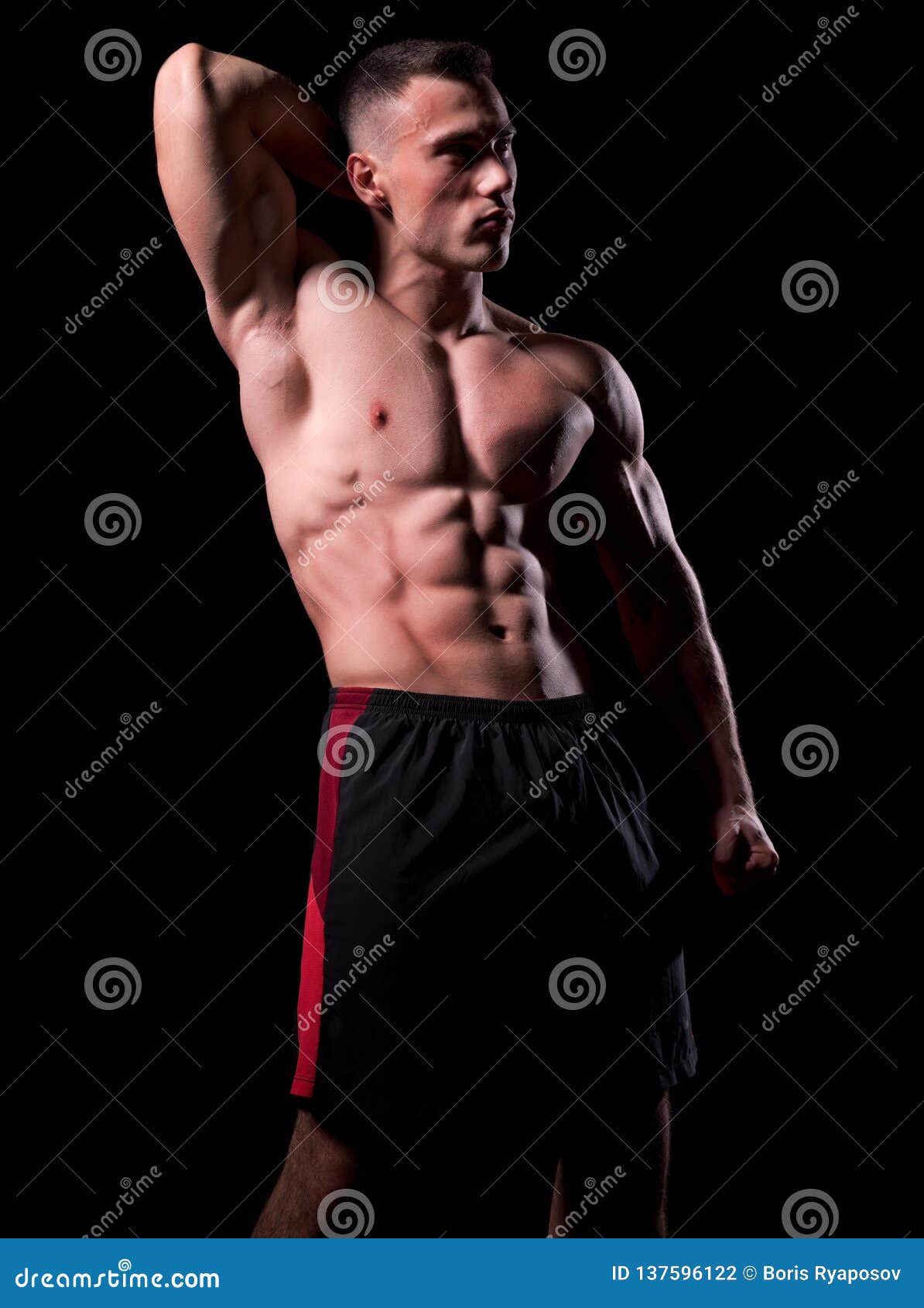 Young strong man isolated stock photo. Image of fitness - 137596122