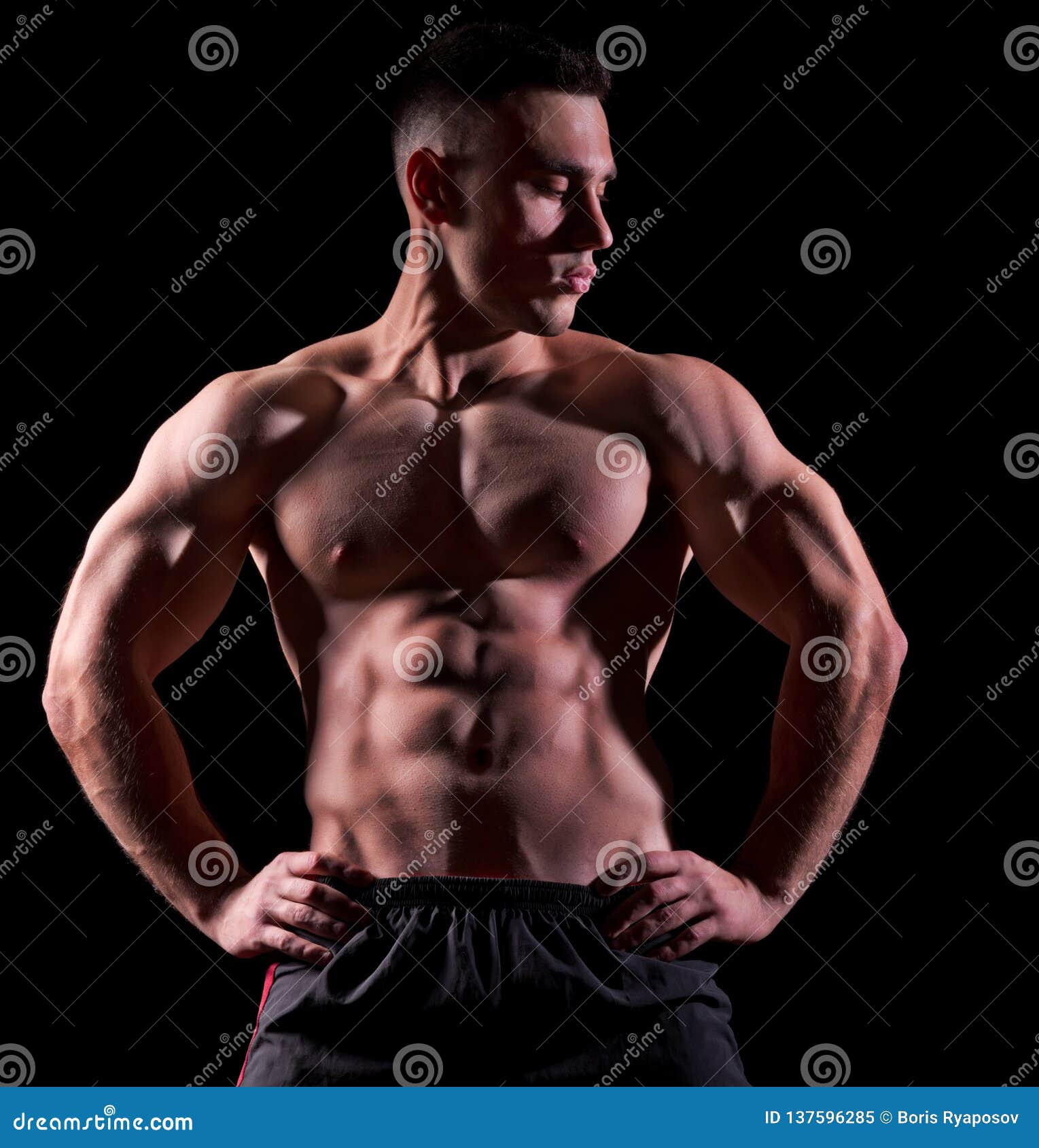 Young strong man isolated stock image. Image of health - 137596285