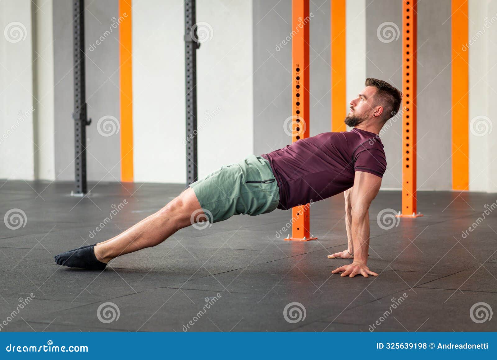 Young Strong Man Performing Calisthenics Reverse Plank Exercise Stock ...