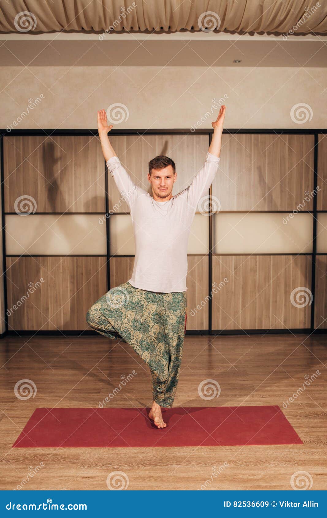Young Strong Man in the Tree Pose Stock Image - Image of asana, balance ...