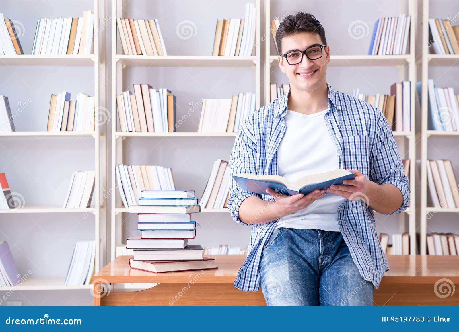 The Young Student with Books Preparing for Exams Stock Photo - Image of ...