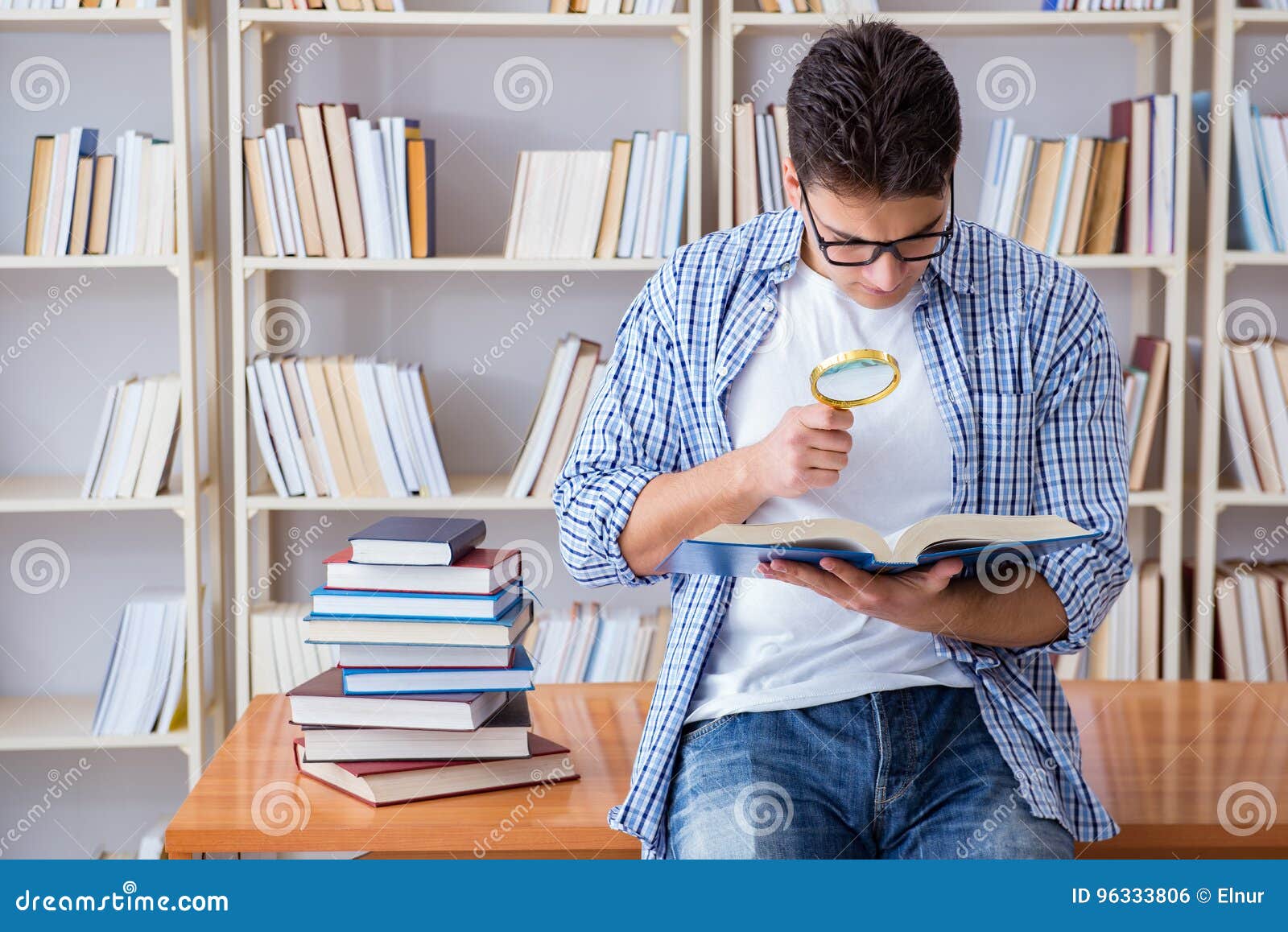 The Young Student with Books Preparing for Exams Stock Photo - Image of ...