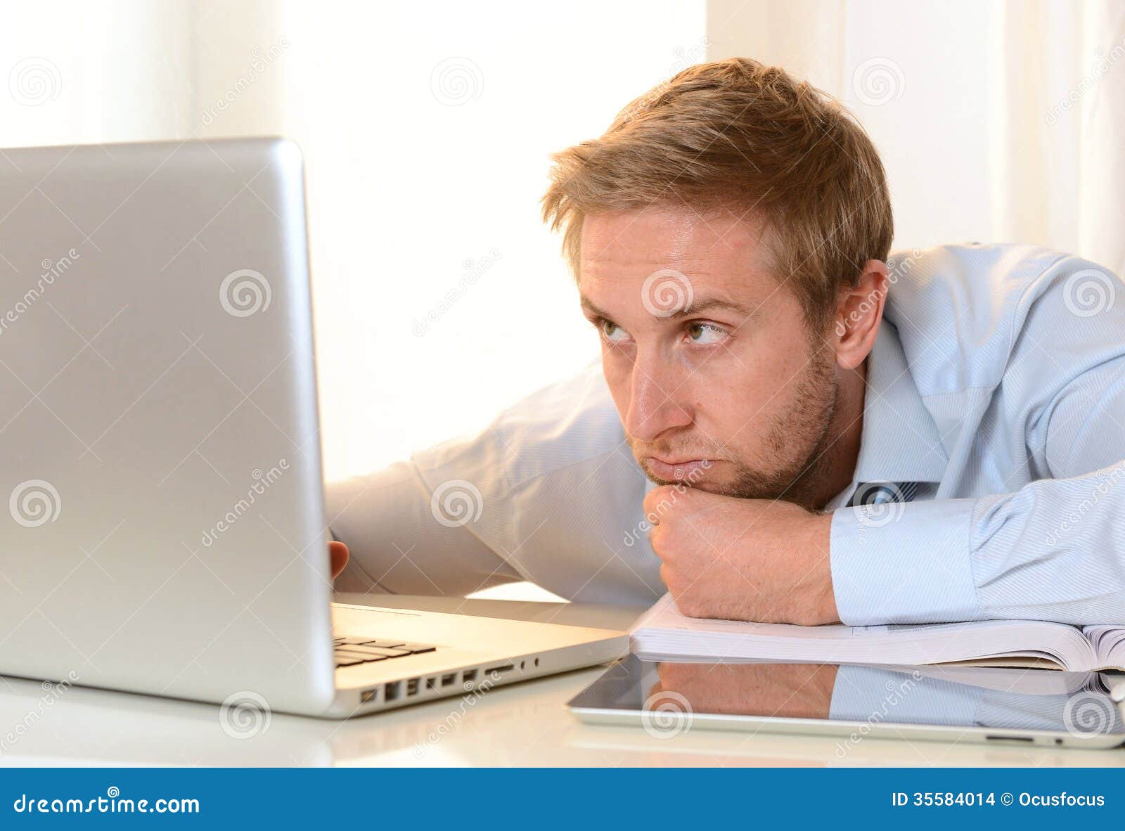Young Student Bored at Work Stock Photo - Image of desk, office: 35584014