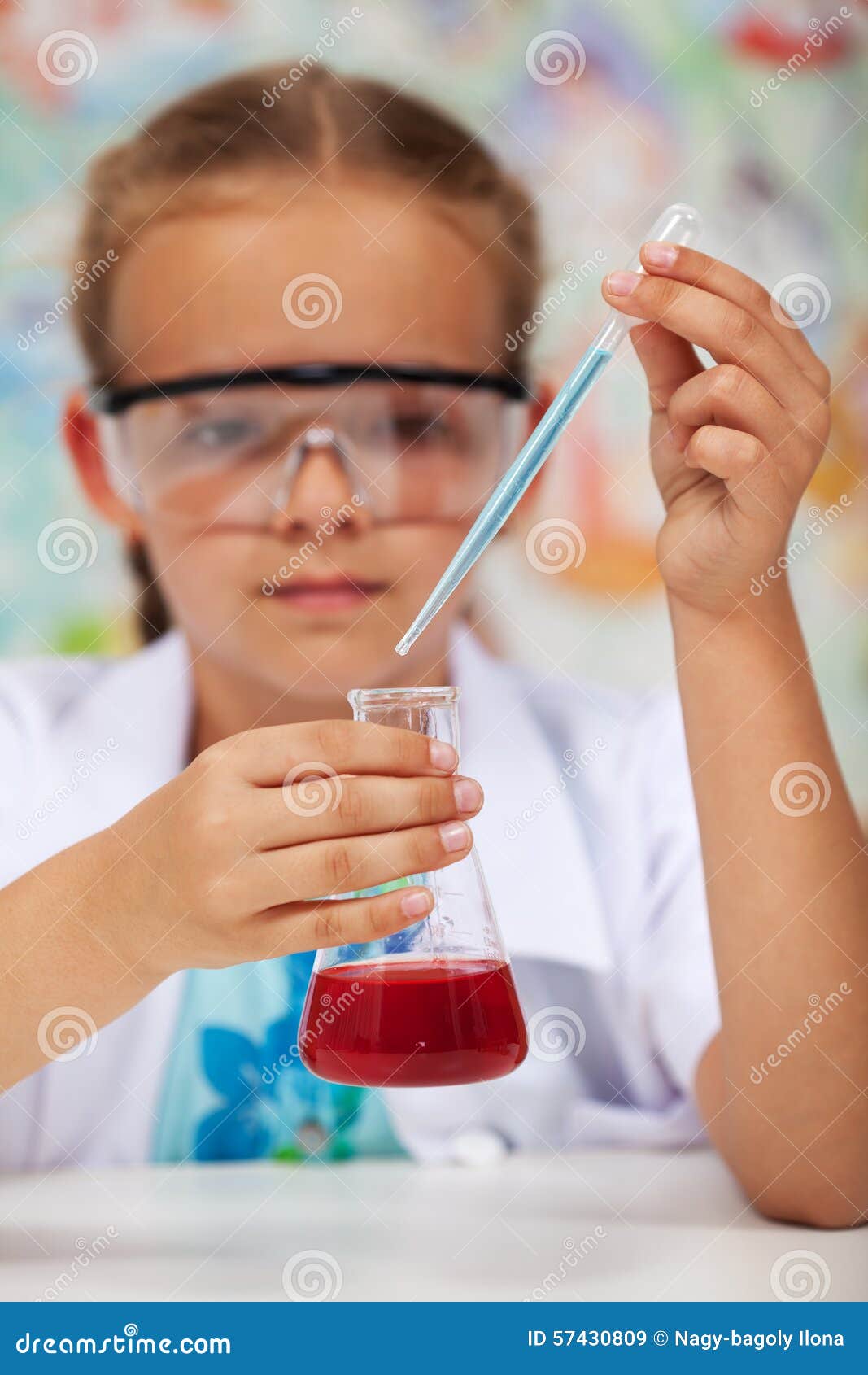 Young Student in Chemistry Class Doing an Experiment Stock Image ...