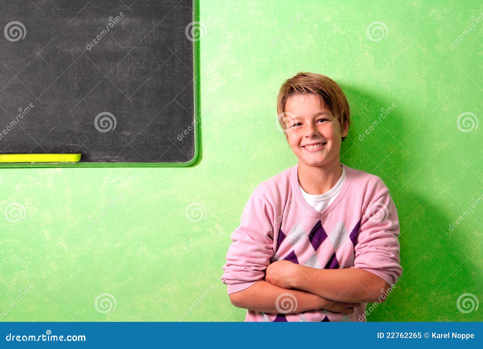 Young Student in Classroom Next To Blackboard Stock Image - Image of ...
