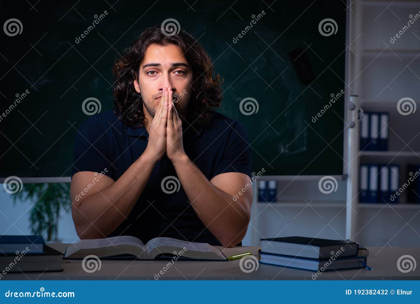 Young Male Student in the Classroom at Night Stock Photo - Image of ...