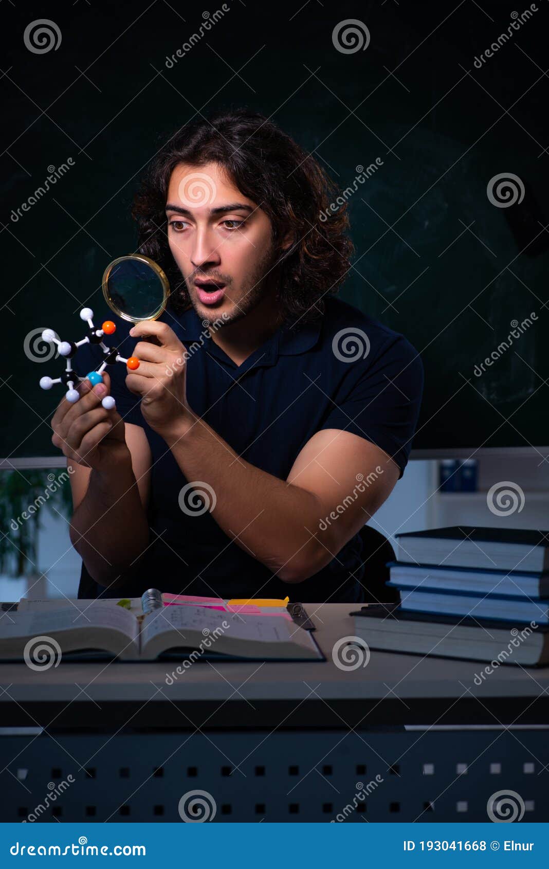 Young Male Student in the Classroom at Night Stock Photo - Image of ...