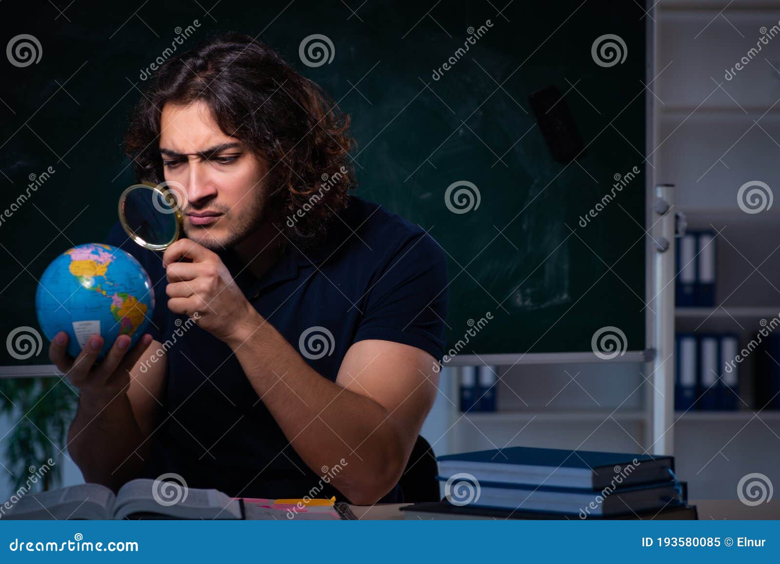 Young Male Student in the Classroom at Night Stock Image - Image of ...
