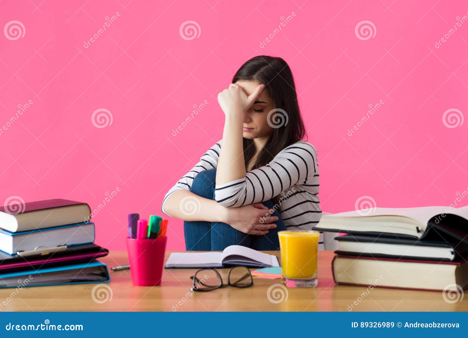 Young Student with Desperate Expression Sitting at Her Desk. Stock ...