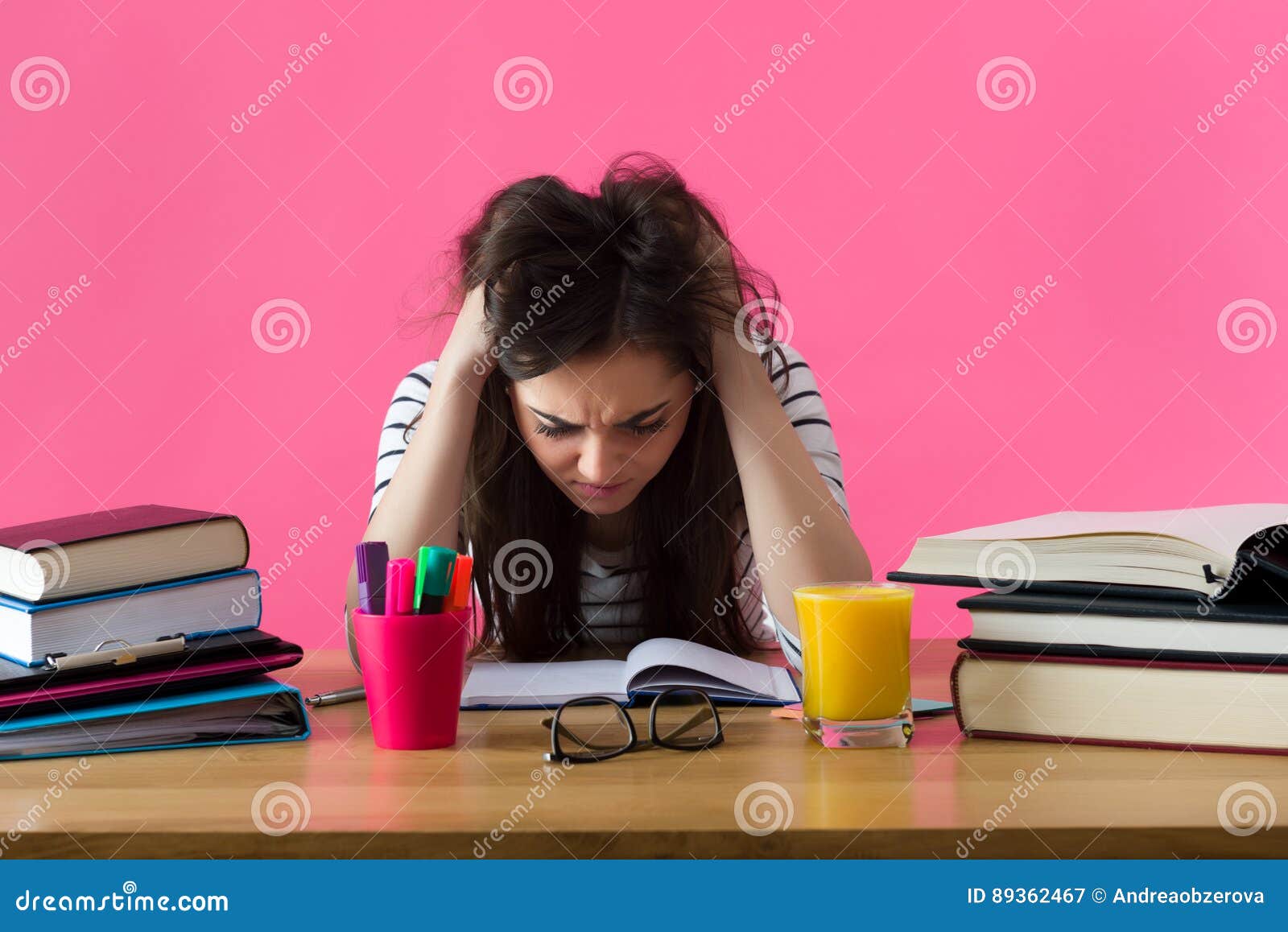 Young Student with Desperate Expression Sitting at Her Desk. Stock ...