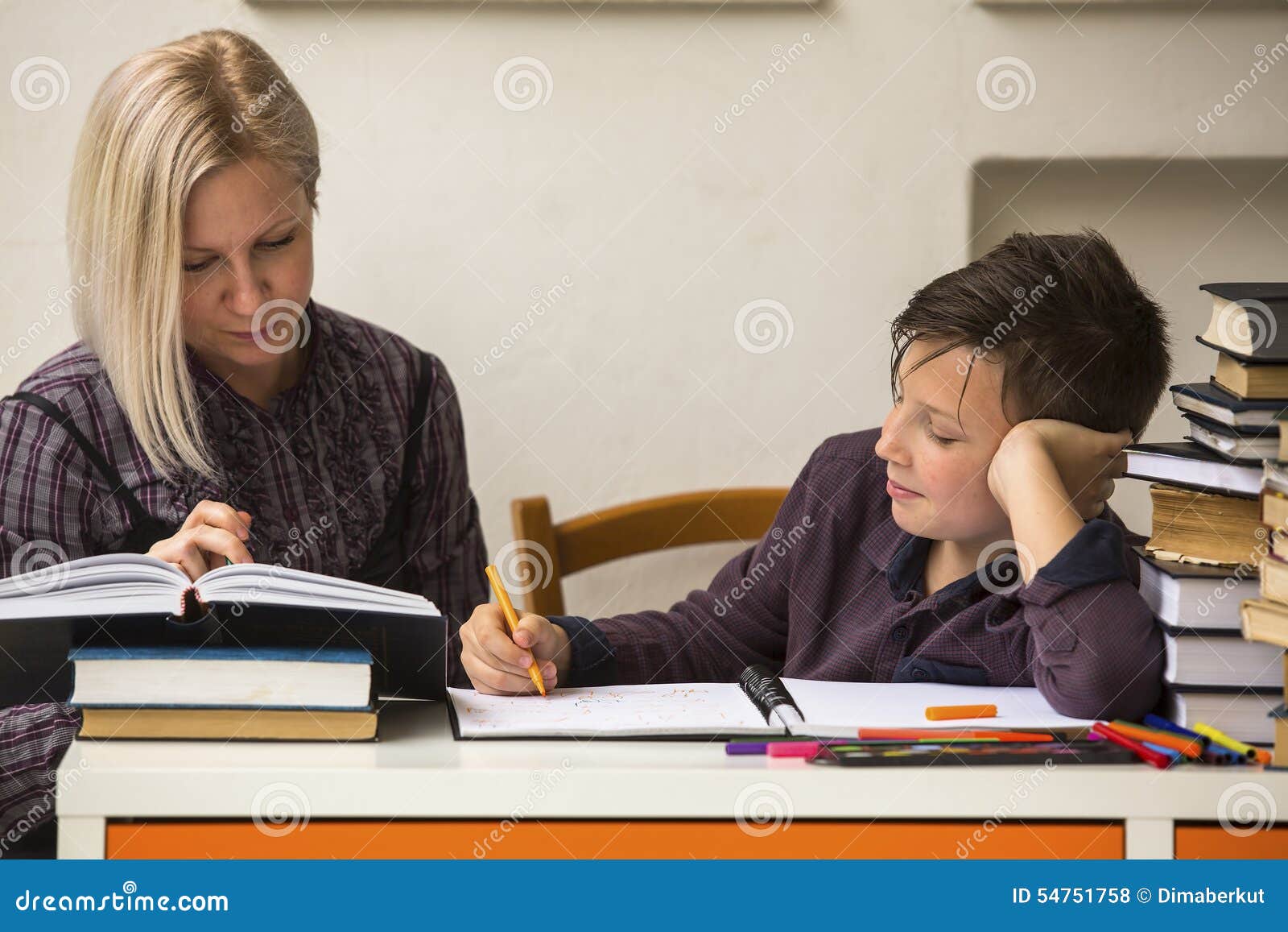 Young Student Doing Homework with a Tutor. Helping. Stock Photo - Image ...
