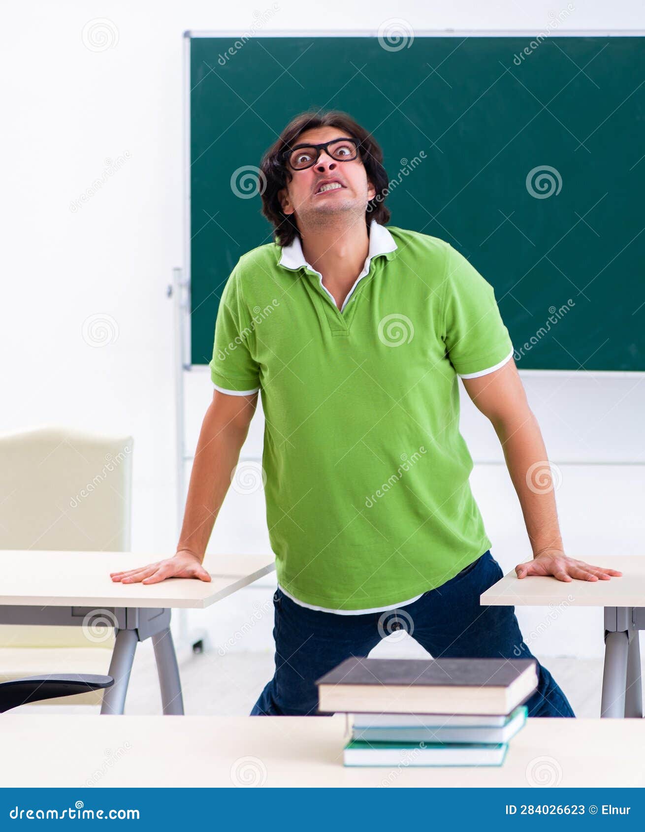 Young Student Doing Physical Exercises in the Classroom Stock Image ...