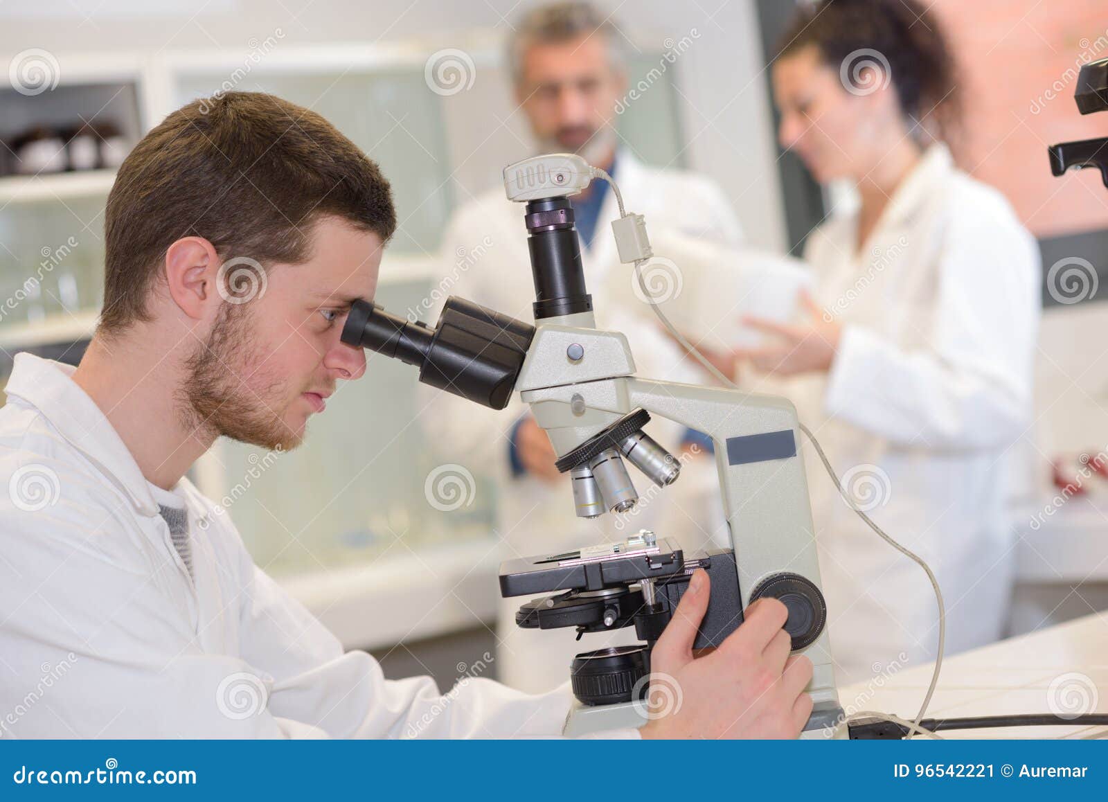 Young Student Doing Reserch with Microscope Stock Image - Image of ...