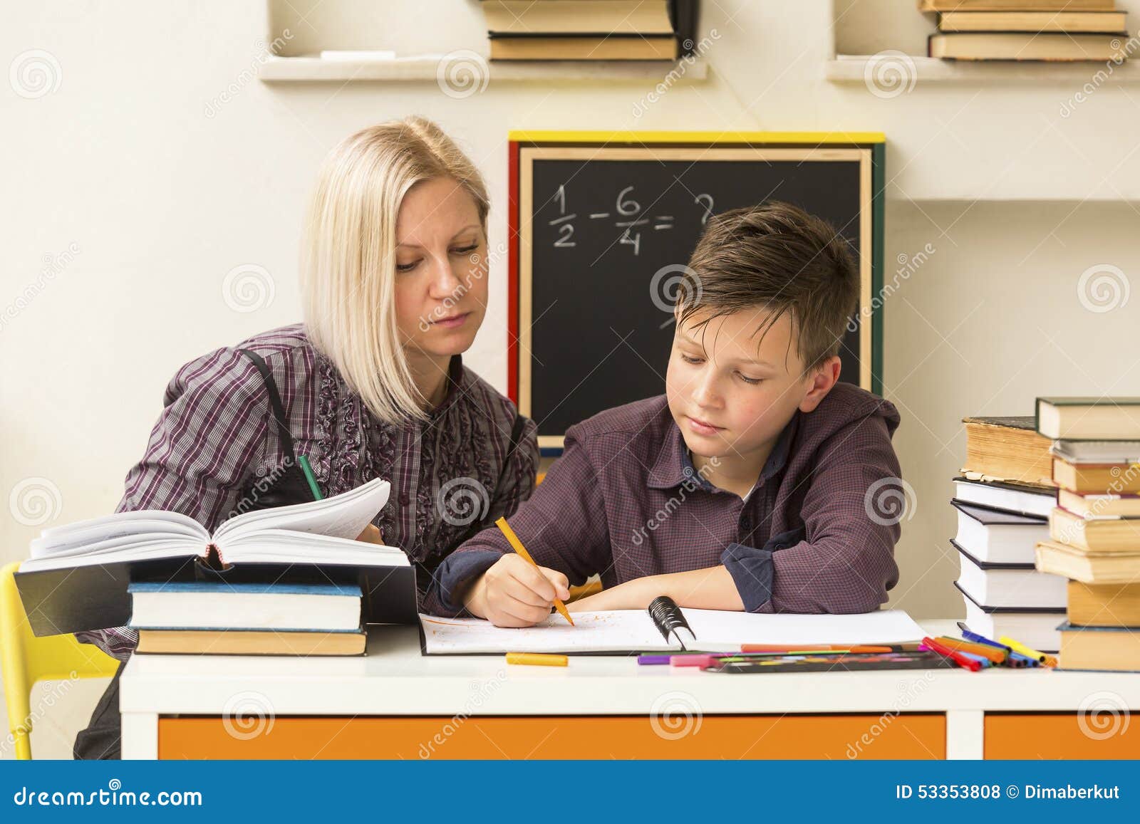 Young Student Engaged with the Teacher. Help. Stock Photo - Image of ...