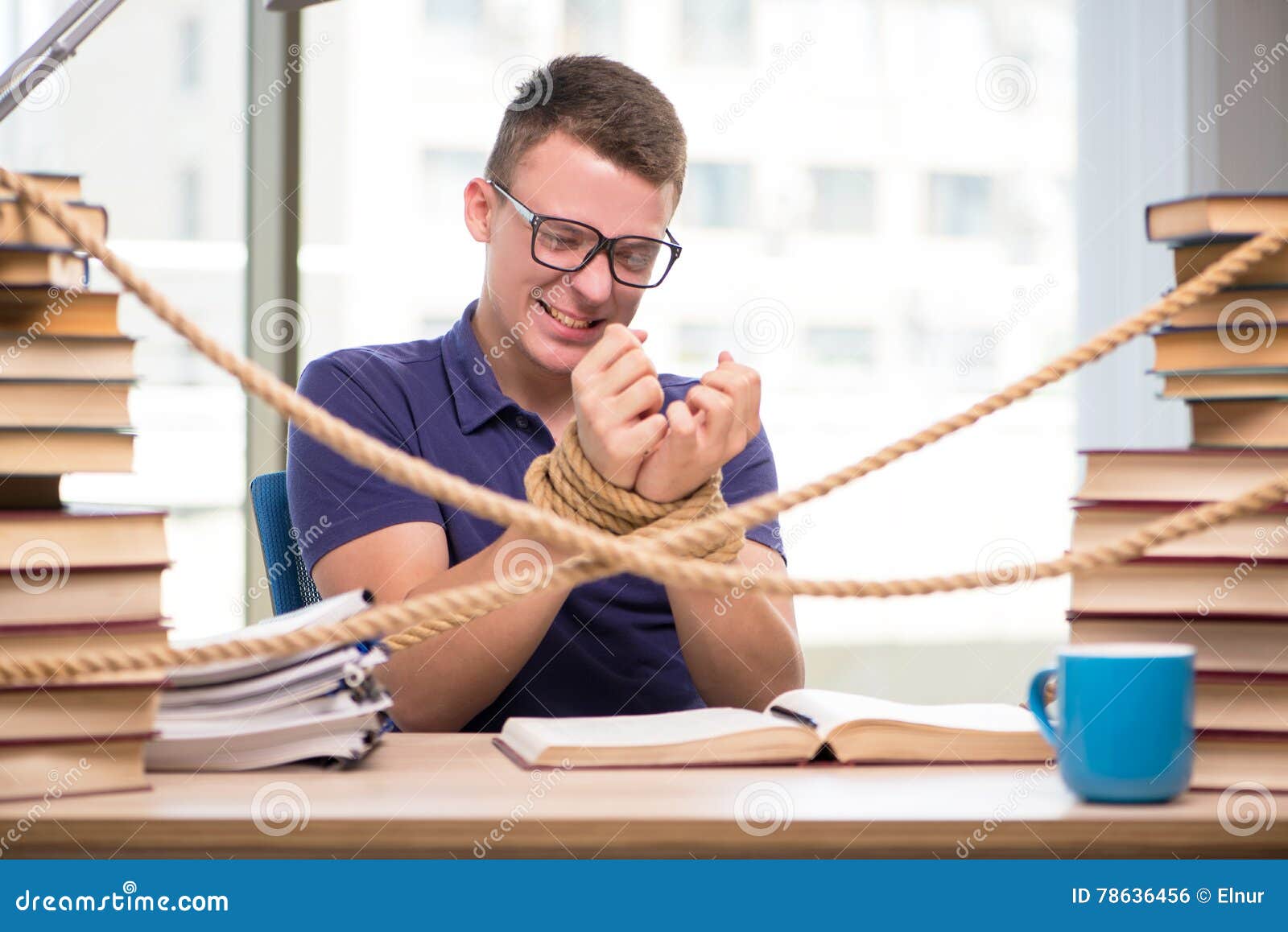 The Young Student Forced To Study Tied Stock Photo - Image of books ...