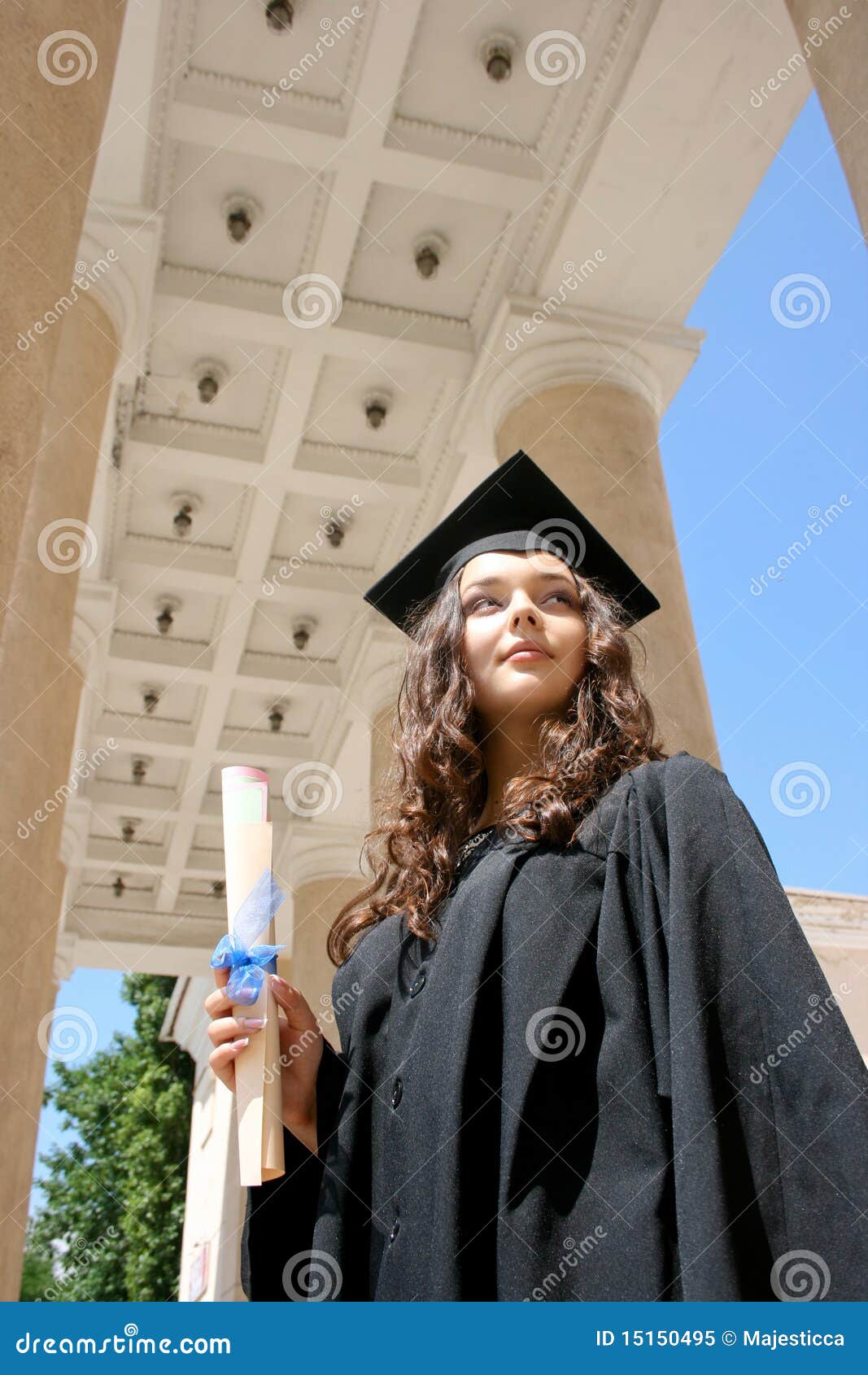 Young Student in Gown Near the University Stock Image - Image of male ...