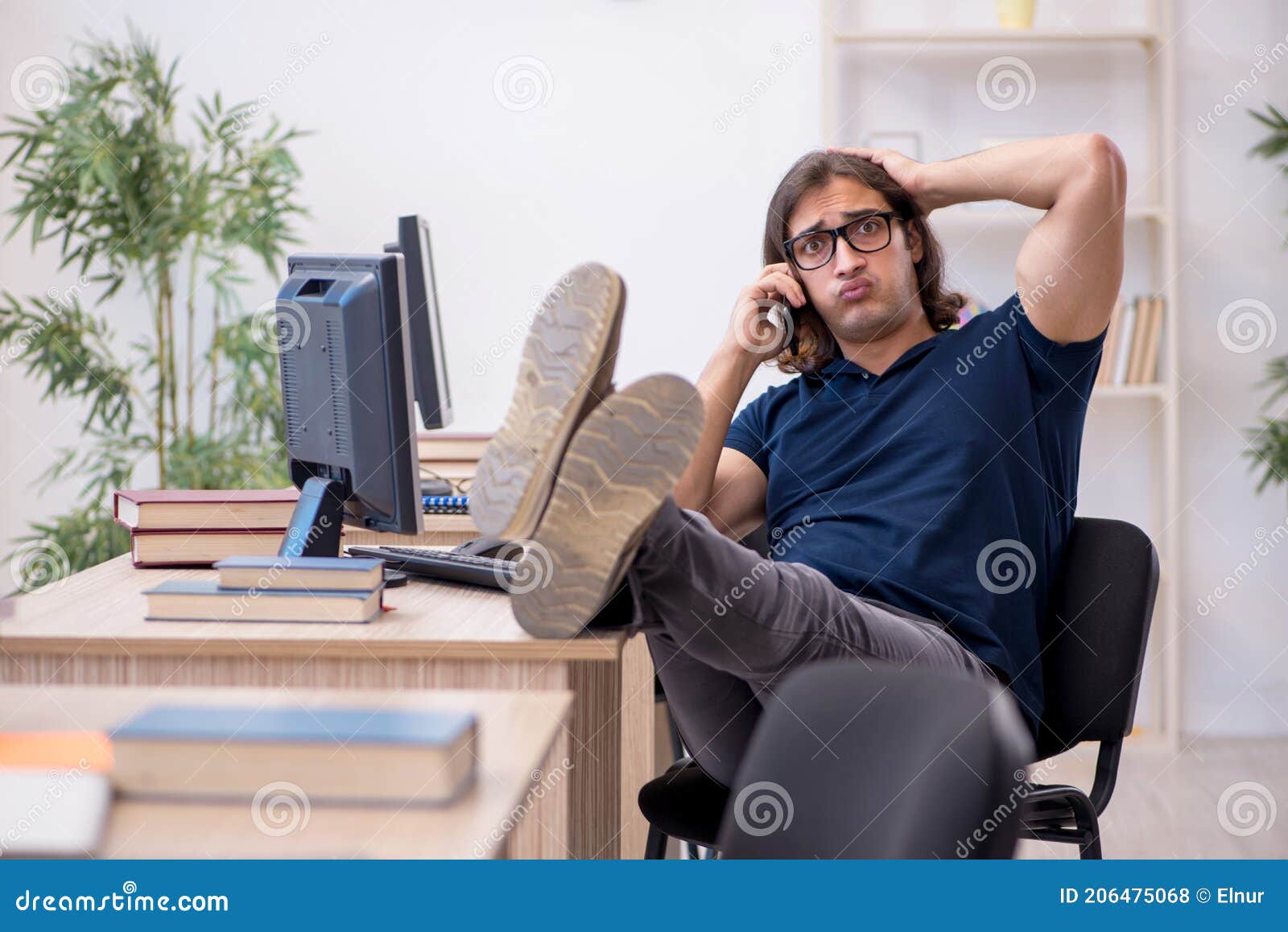 Young Male Student Having Break during Exam Preparation Stock Photo ...