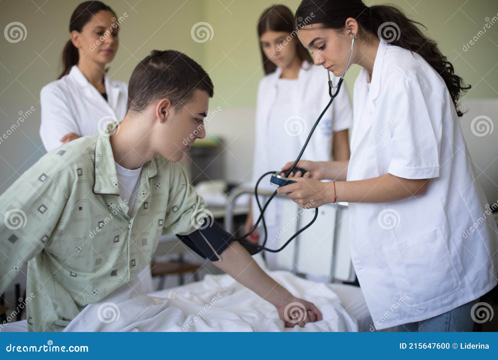 Student in Hospital Measures the Patient`s Pressure Stock Photo - Image ...