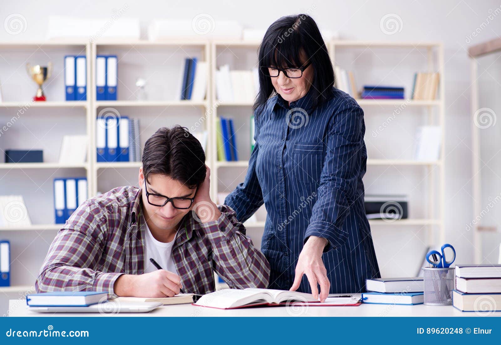 The Young Student during Individual Tutoring Lesson Stock Photo - Image ...