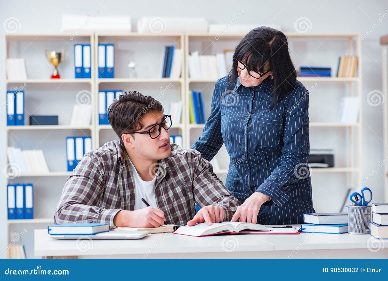 The Young Student during Individual Tutoring Lesson Stock Photo - Image ...