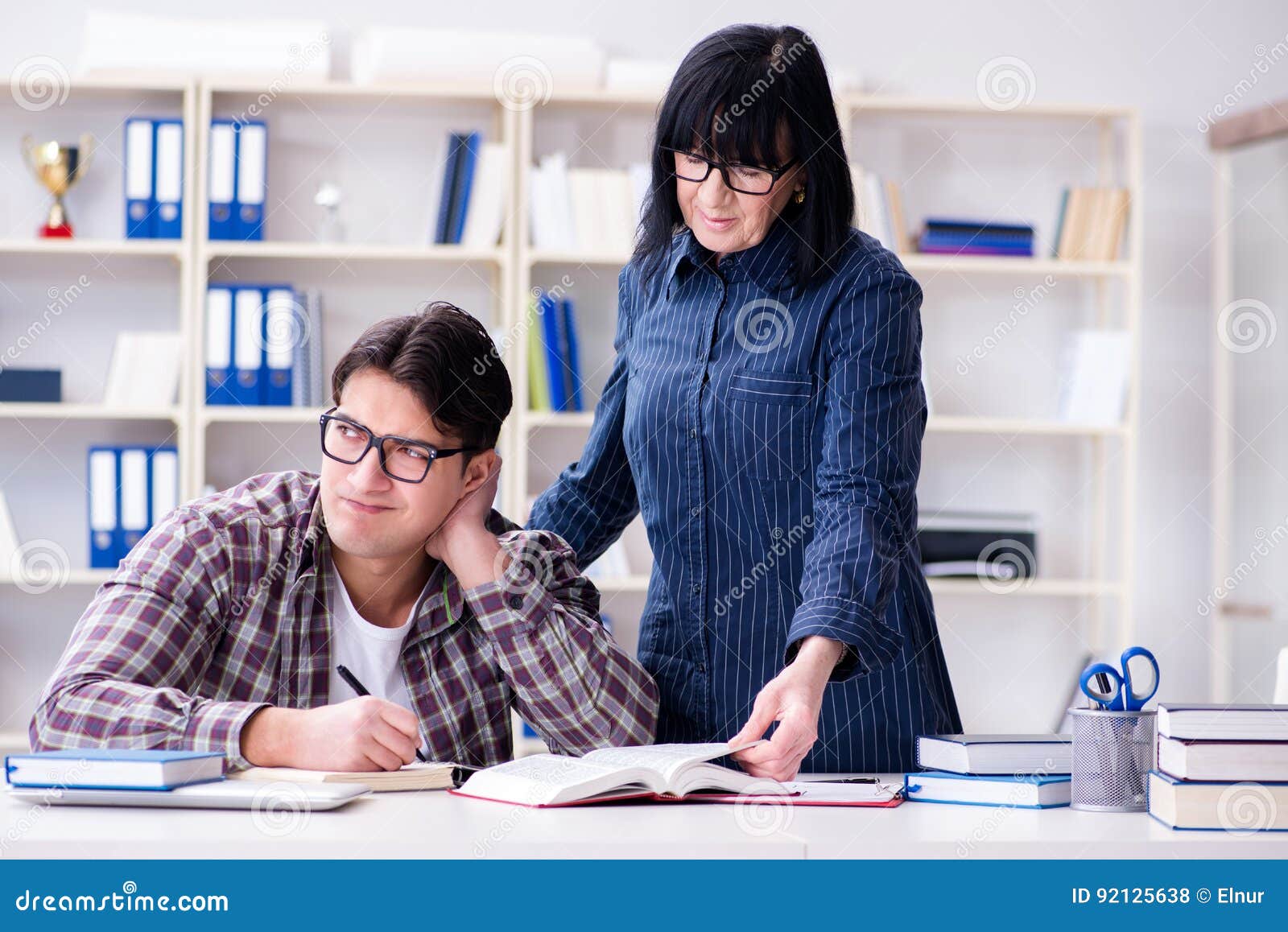 The Young Student during Individual Tutoring Lesson Stock Photo - Image ...