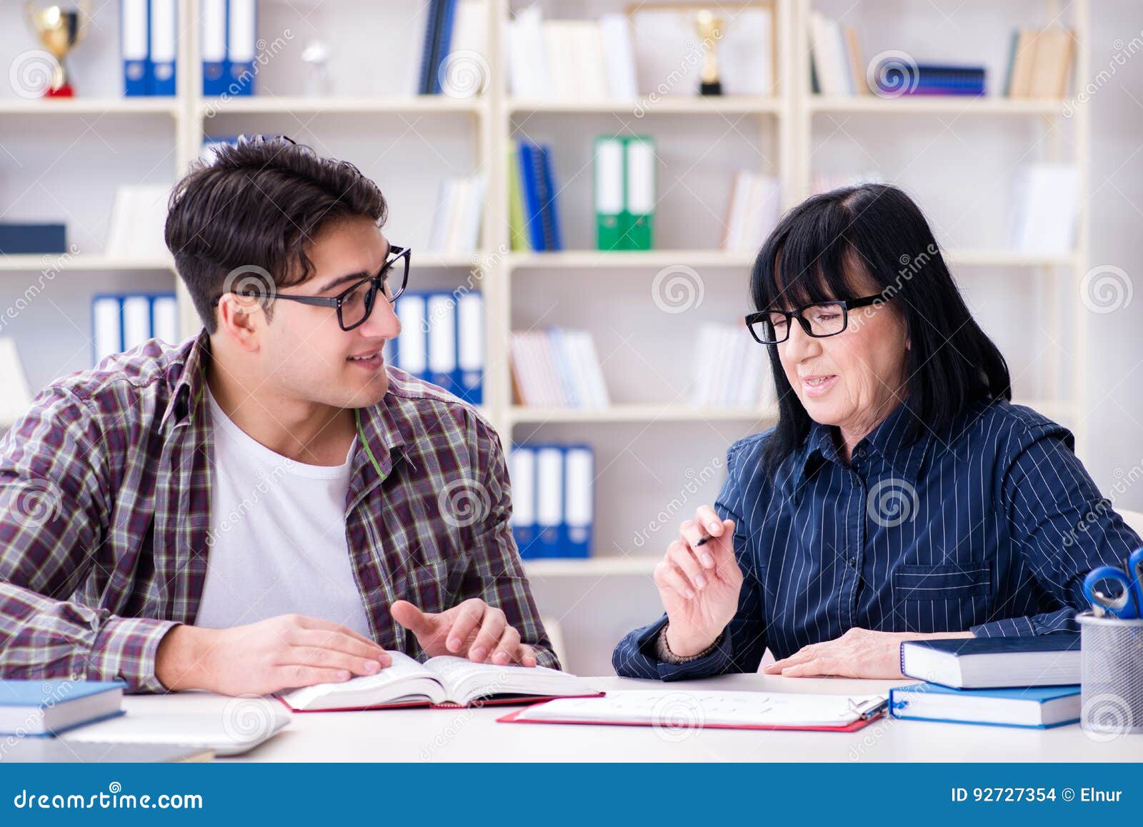 The Young Student during Individual Tutoring Lesson Stock Photo - Image ...