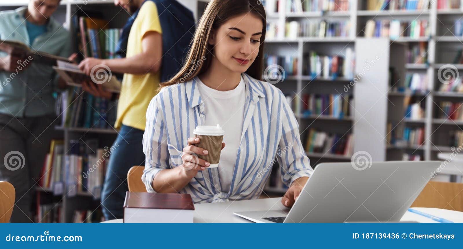 Young Student with Laptop at Table in Library. Banner Design Stock ...