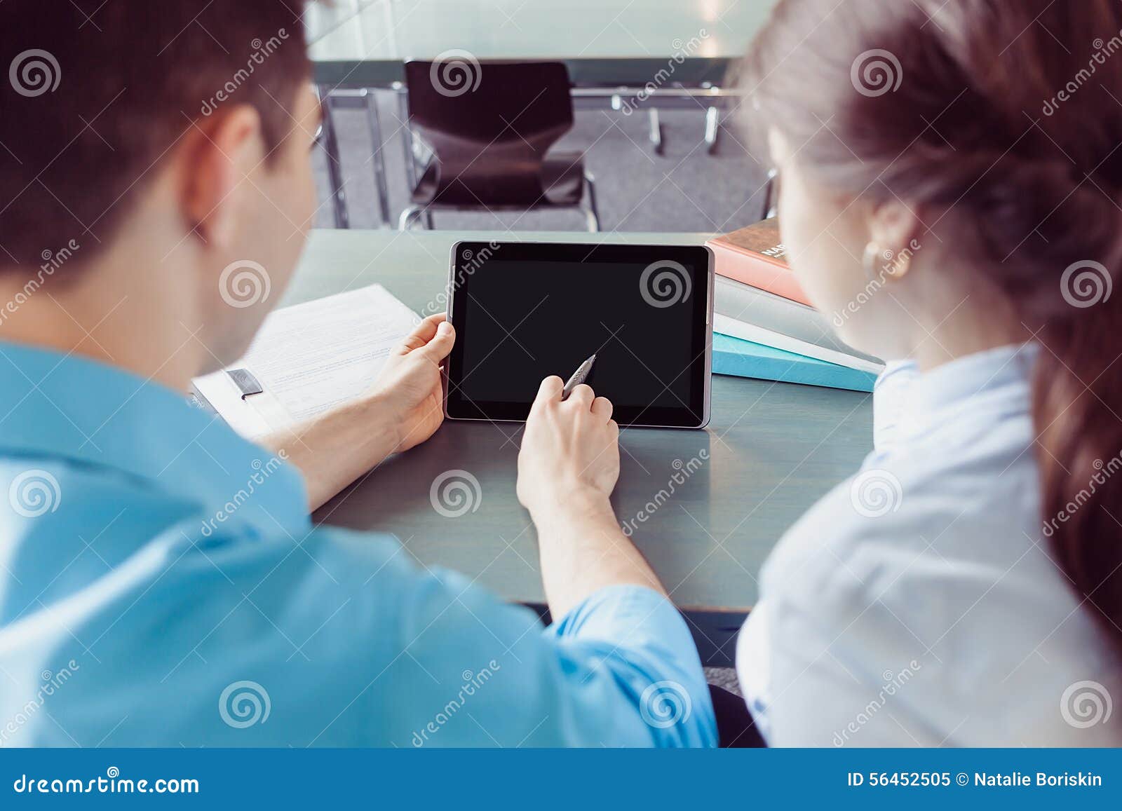 Young Student Learning and Hands Typing on Tablet in Library Stock ...