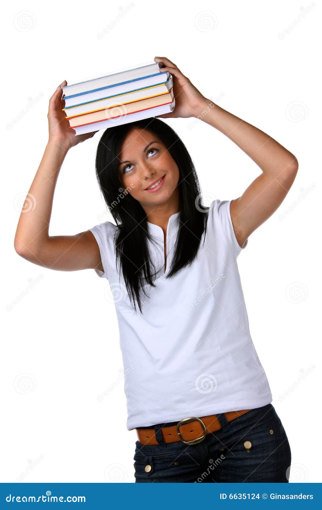 Young Student Learns a Stack of Books on the Head Stock Photo - Image ...