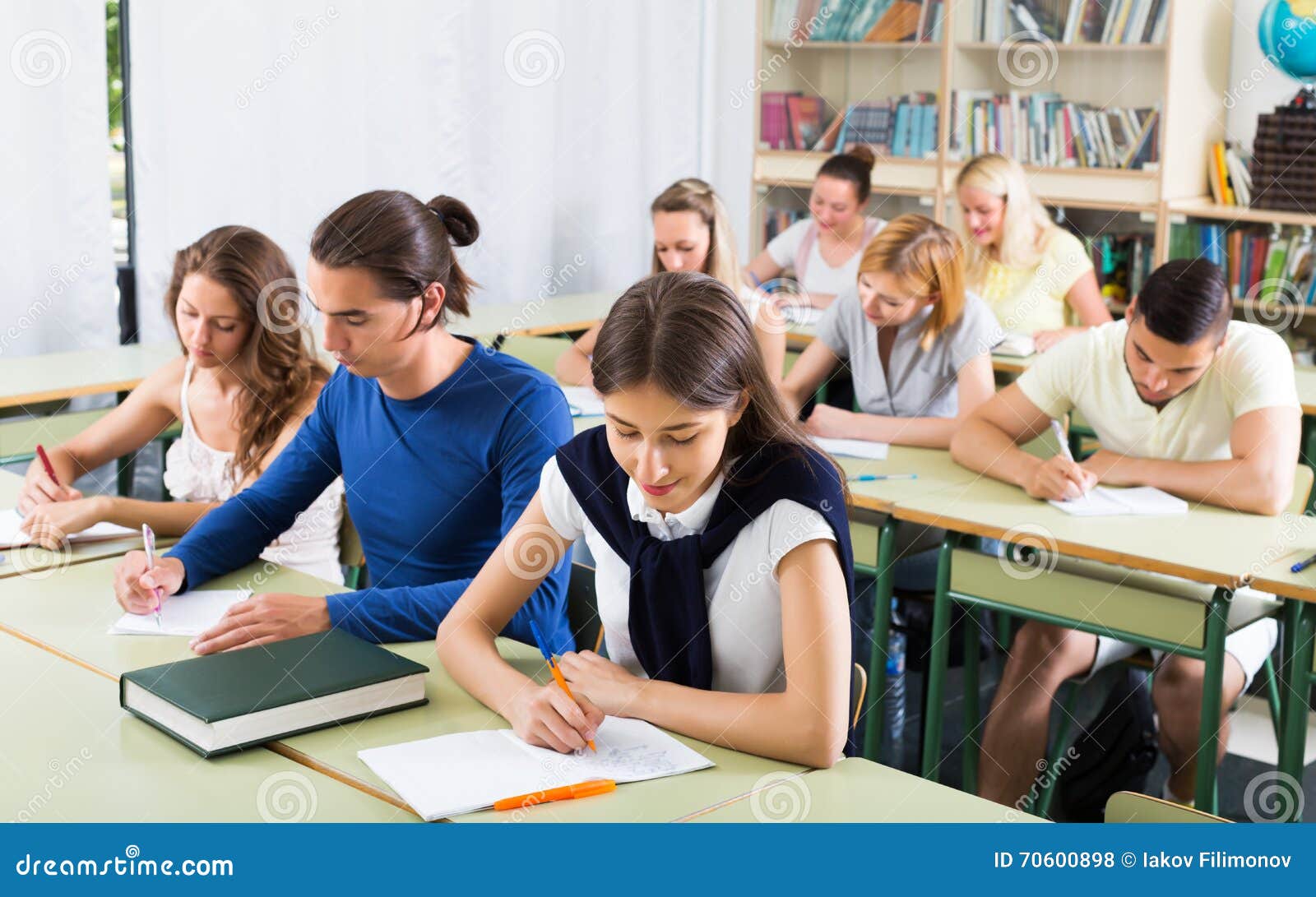 Young Student Listening Attentively Stock Photo - Image of education ...