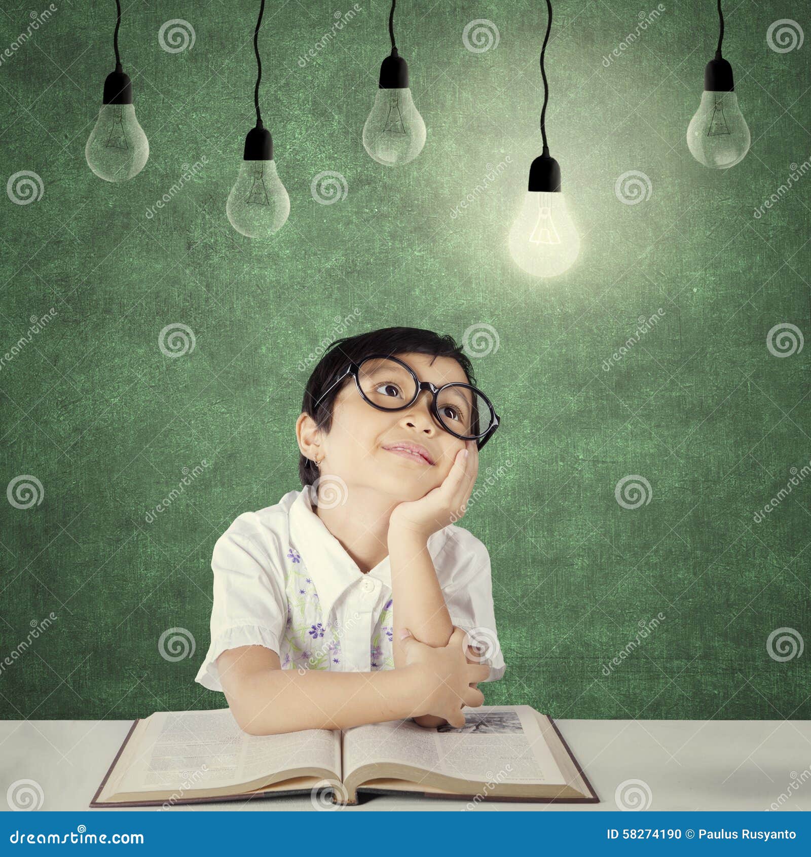 Young Student Look at the Bright Light Bulb Stock Photo - Image of ...