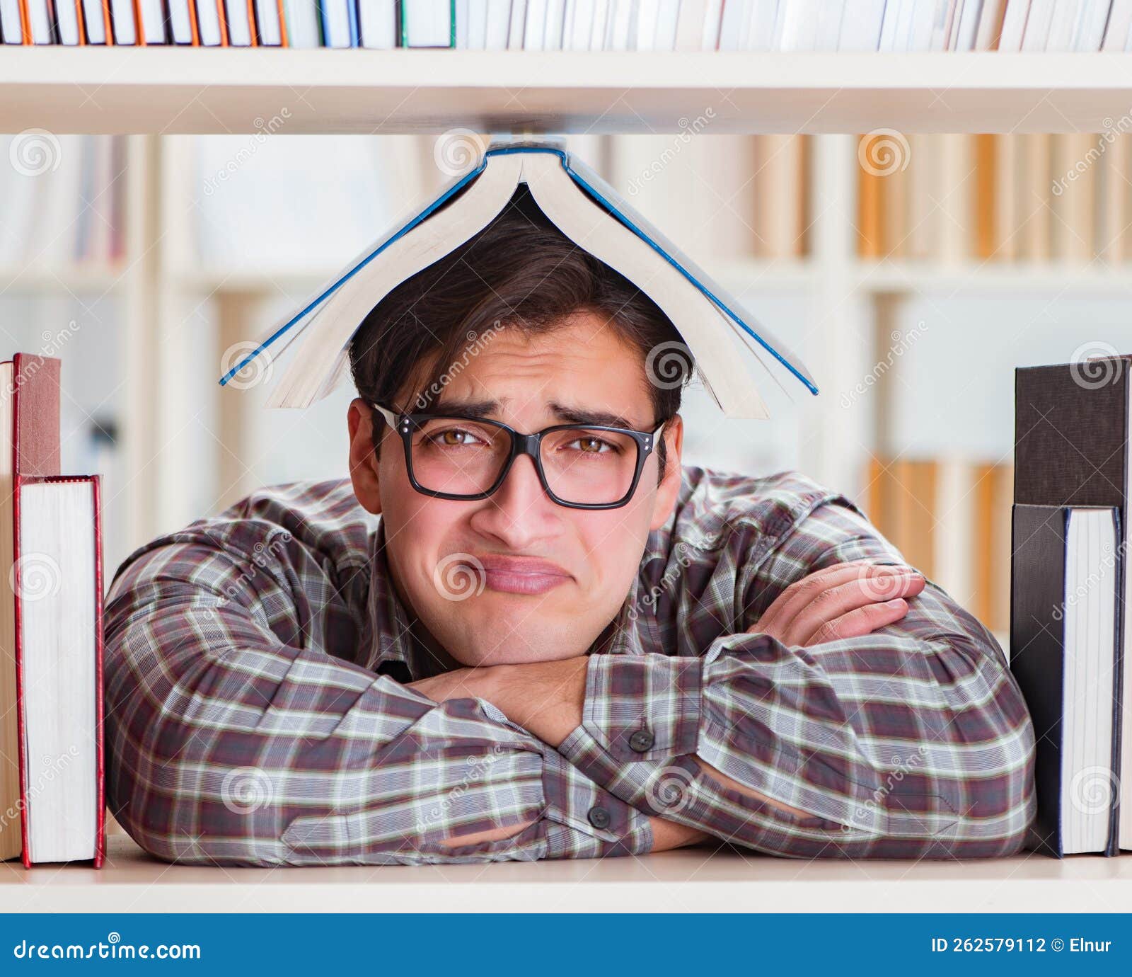Young Student Looking for Books in College Library Stock Photo - Image ...