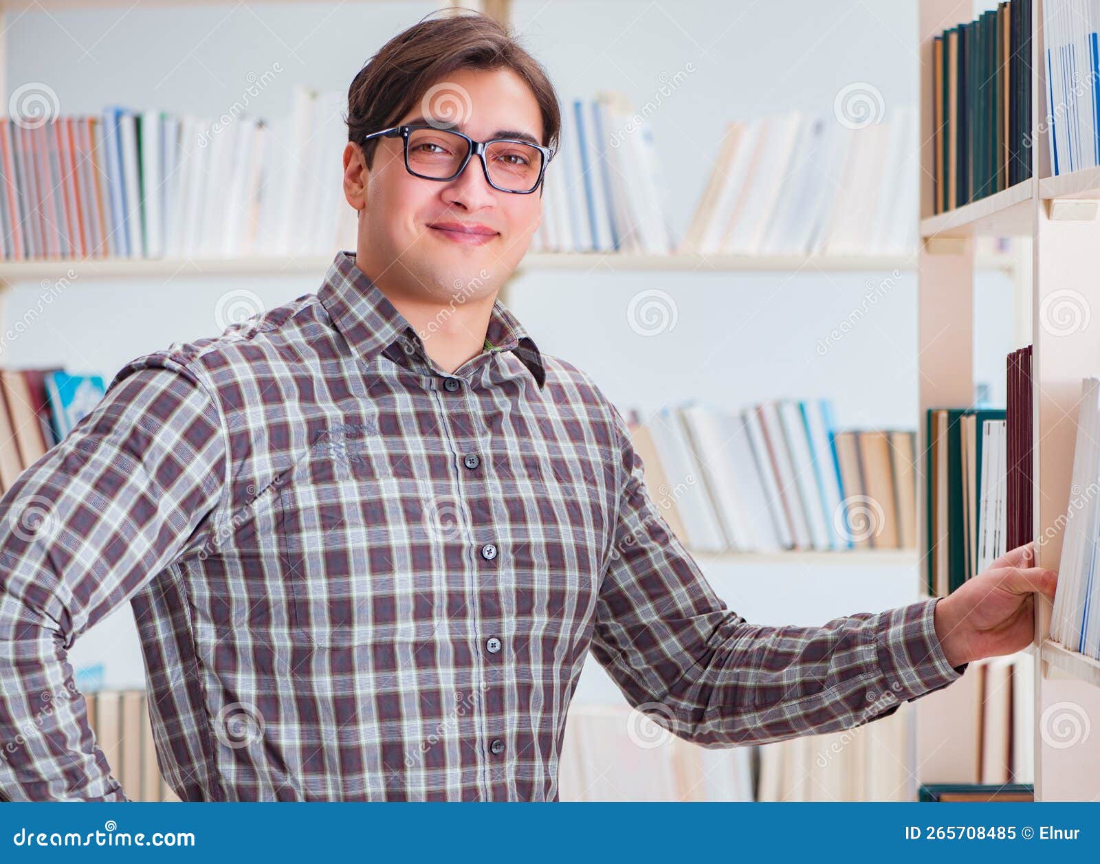 Young Student Looking for Books in College Library Stock Image - Image ...