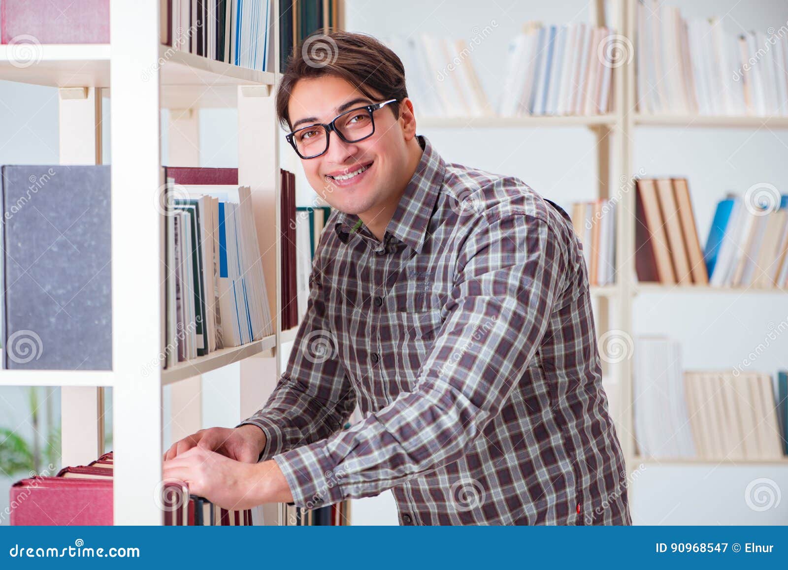 The Young Student Looking for Books in College Library Stock Image ...