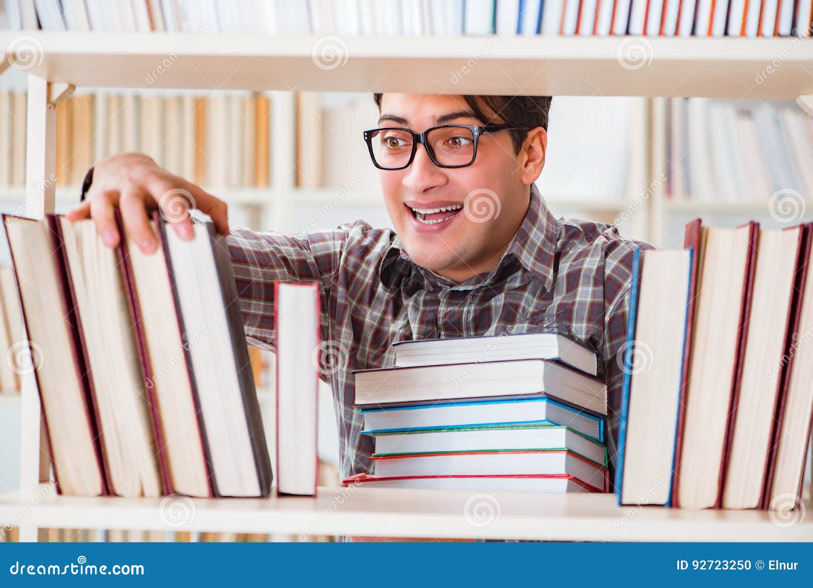 The Young Student Looking for Books in College Library Stock Photo ...