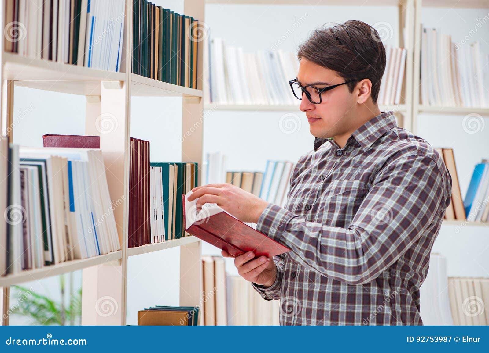 The Young Student Looking for Books in College Library Stock Image ...