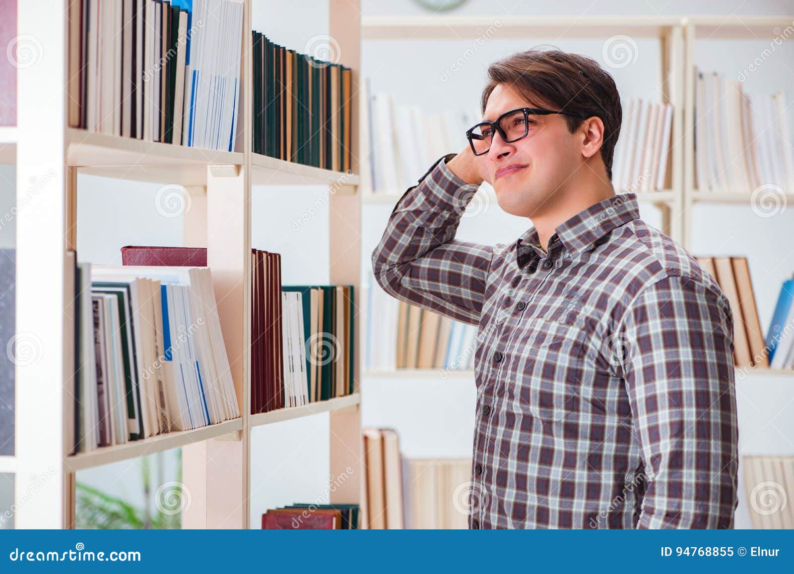 The Young Student Looking for Books in College Library Stock Image ...