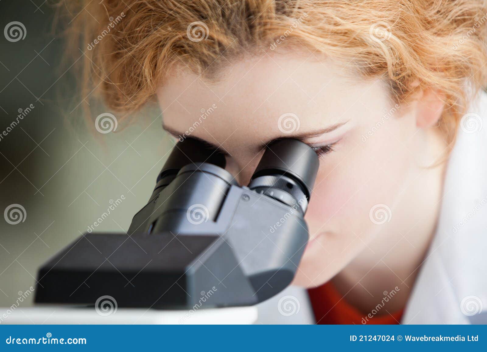 A Young Student Looking into a Microscope Stock Photo - Image of look ...