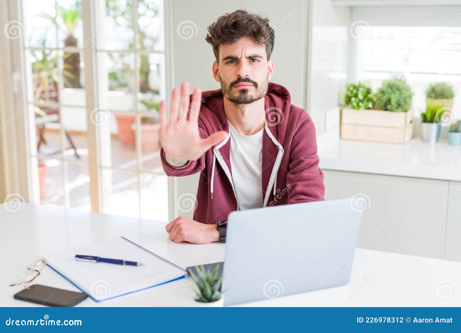 Young Student Man Using Computer Laptop and Notebook with Open Hand ...