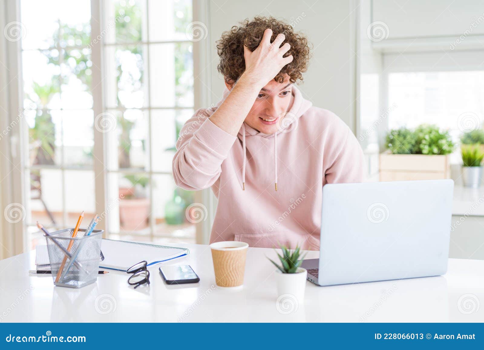 Young Student Man Working and Studying Using Computer Laptop Stressed ...